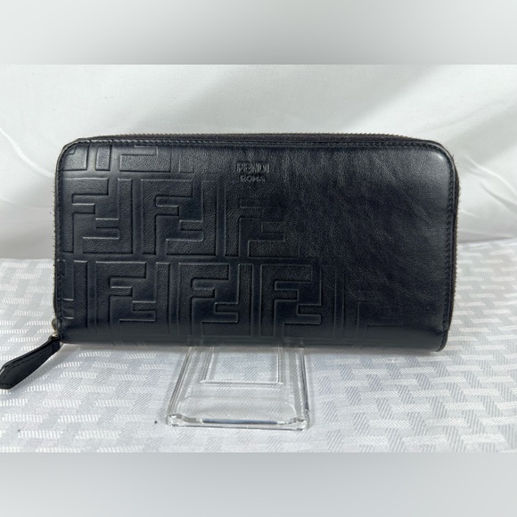 Fendi | Bags | Fendi Black Embossed Ff Leather Zip Wallet Red Interior ...